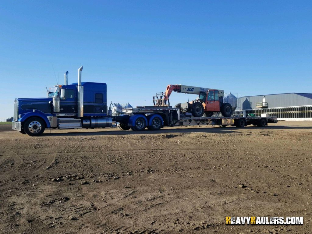 How to Load a Boom Lift Onto a Trailer | Heavy HaulersHeavy Haulers ...