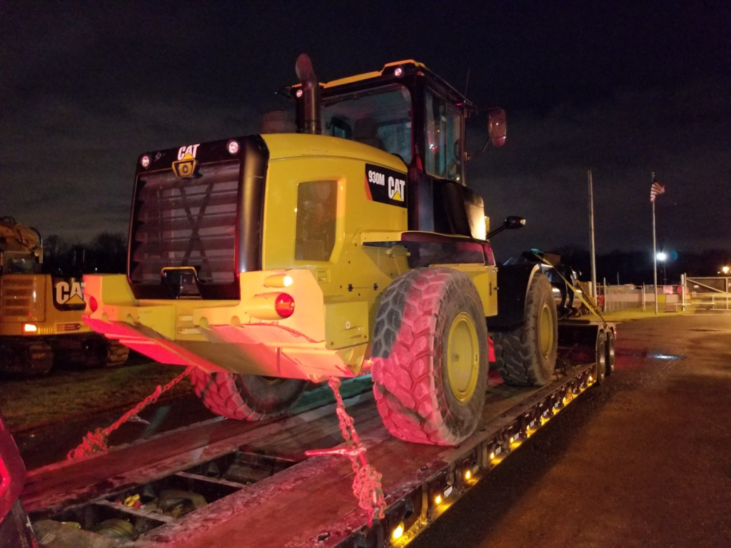 Transporting a CAT 930M Wheel Loader With Heavy Haulers