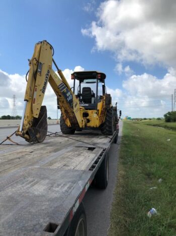 Tips to Load and Transport Your Backhoe - Heavy Haulers BlogHeavy ...