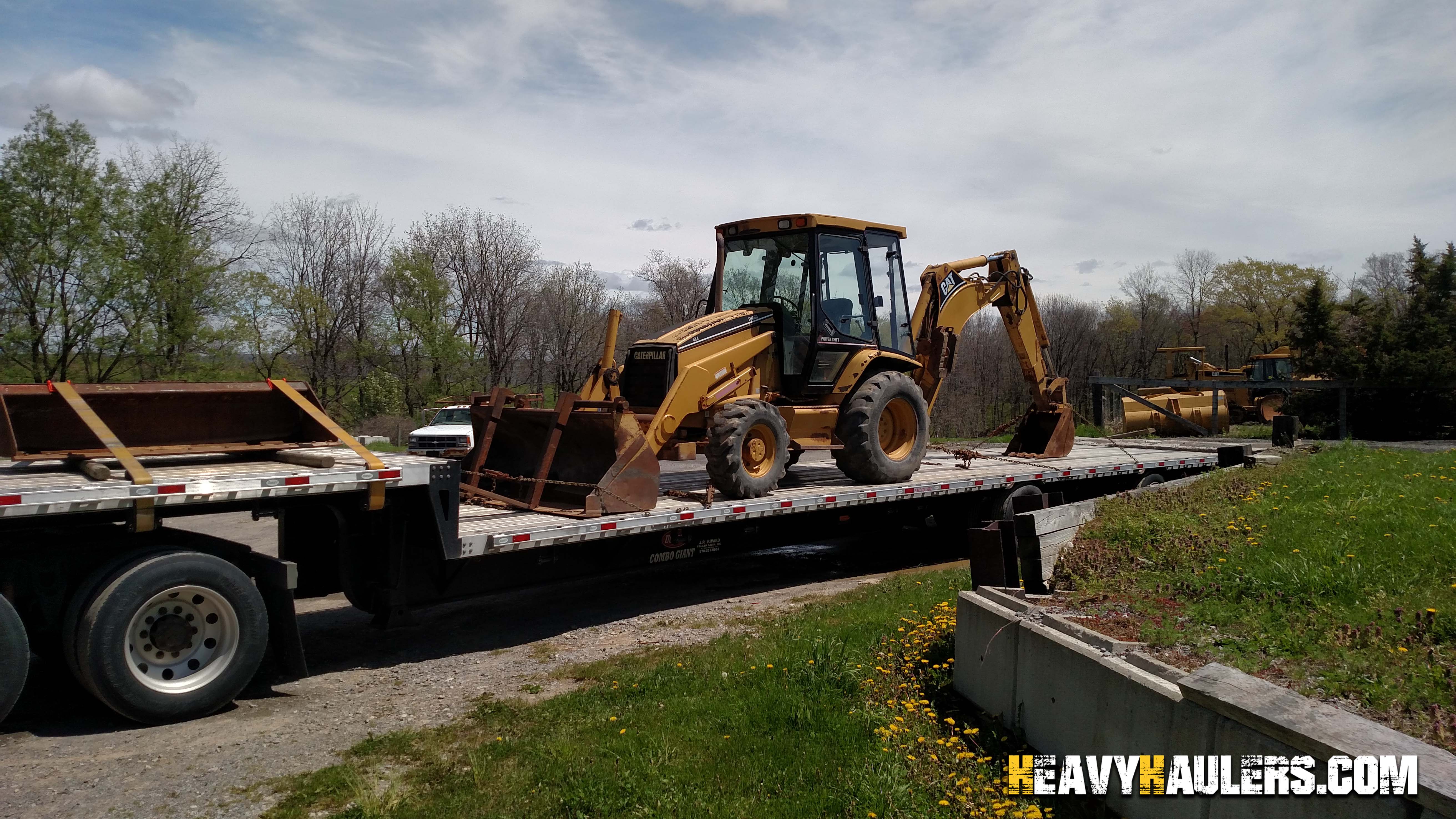 Backhoe Shipping Services | Heavy Haulers | (800) 908-6206