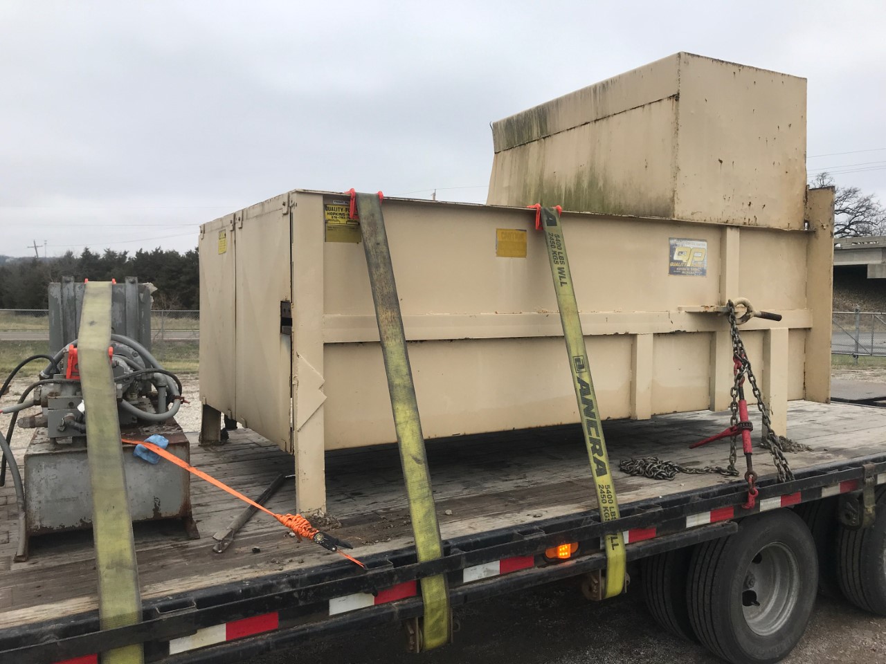 Trash Compactor Shipping | Heavy Haulers | (800) 908-6206