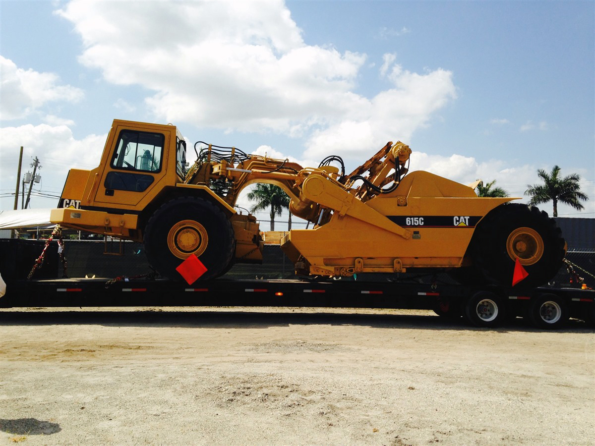 Construction Scraper Transport and Shipping | Heavy Haulers